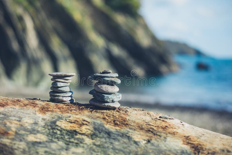 Small Rocks Piled on a Boulder Near a Stream Stock Photo - Image of ...