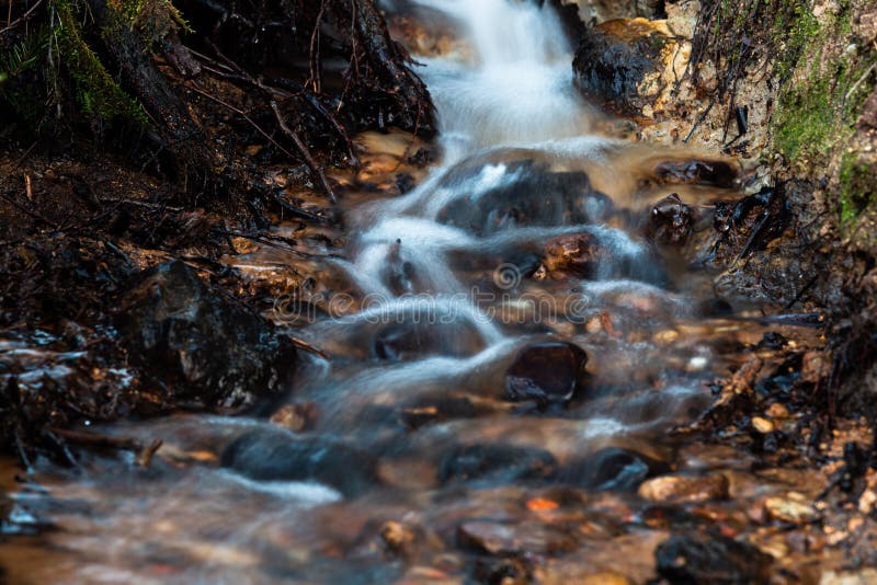 A Small Rocky River with a Small Waterfall Stock Photo - Image of fall ...