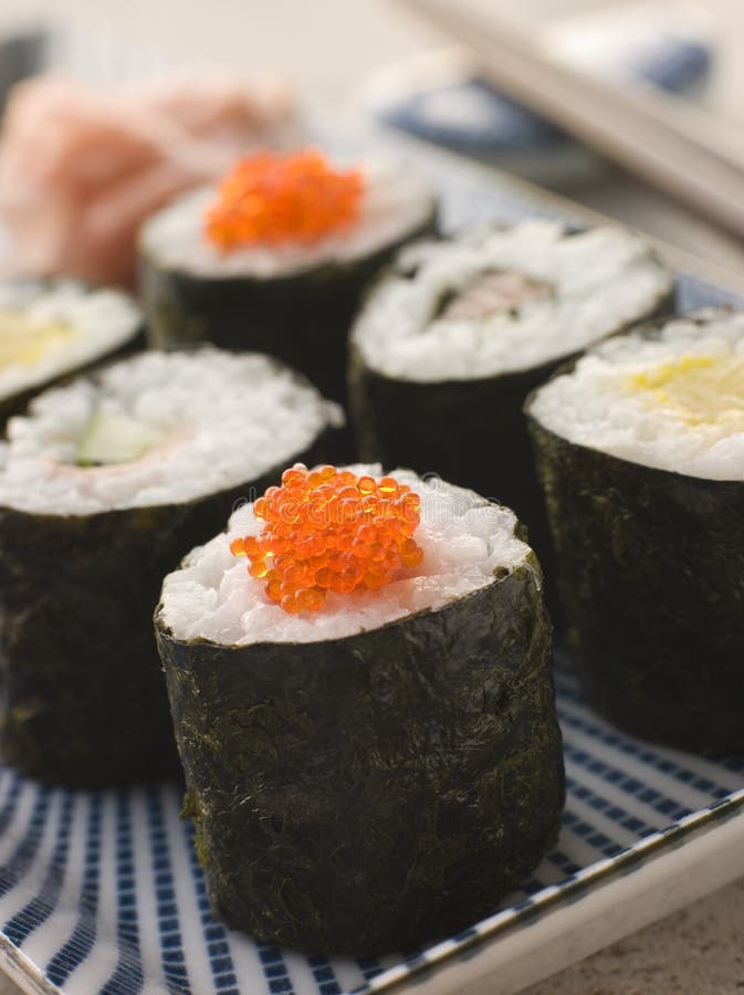 Small Rolled Sushi on a Plate Stock Photo - Image of fast, plates: 5356990