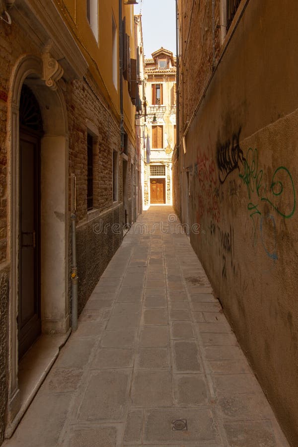 A small alley in Venice stock photo. Image of urban - 148289340