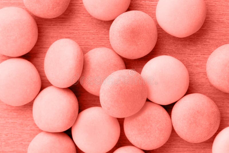 Small Round Candy Living Coral Pastel Background Stock Photo - Image of ...