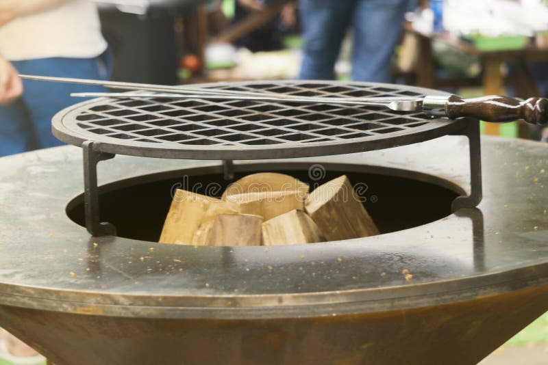 Small Round Charcoal Grill Ready for Grilling at the Summer Picnic ...