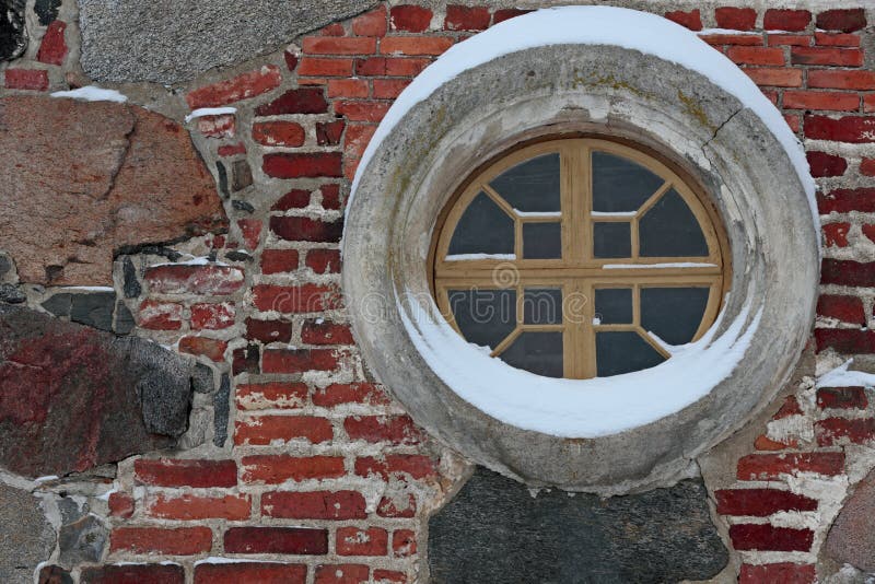 A Small Round and Decorative Window of an Ancient Church Stock Photo ...