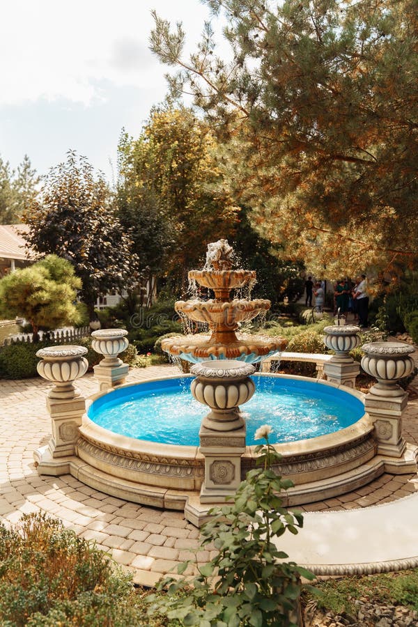 A Small Round Fountain in the Park. Stock Photo - Image of natural ...