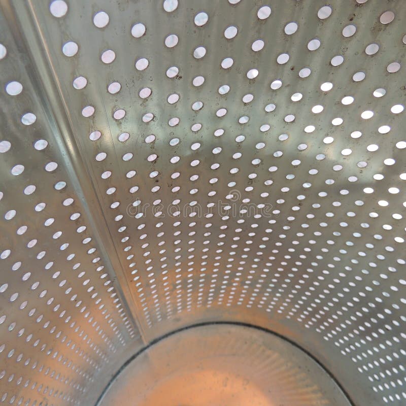 Small Round Holes in a Thin Metal Sheet Stock Photo - Image of ...