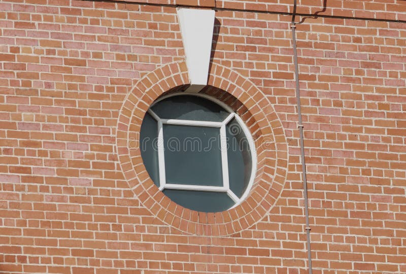 Round Window and Red Bricks Stock Photo - Image of window, brick: 110378210