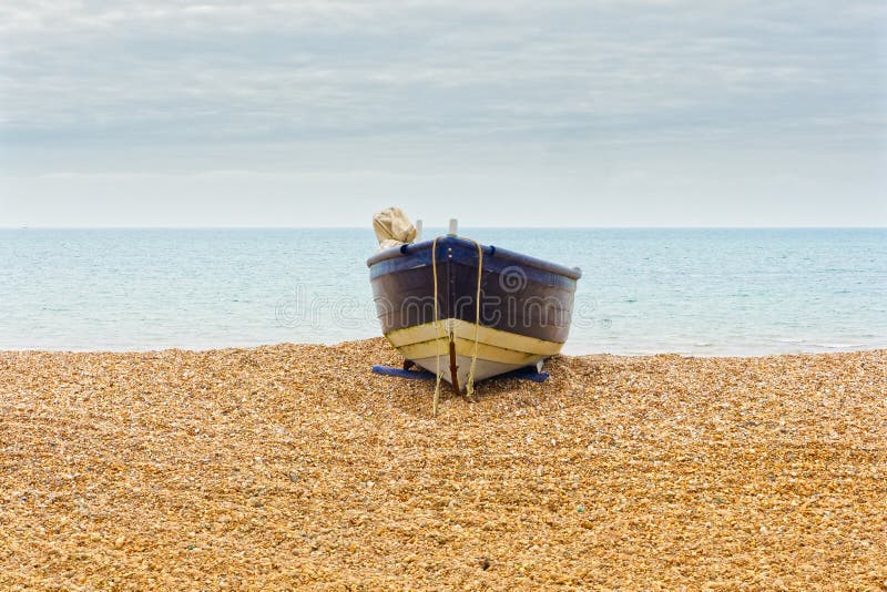 Small Rowing Boat Beached on Bognor Regis Beach Stock Image - Image of ...