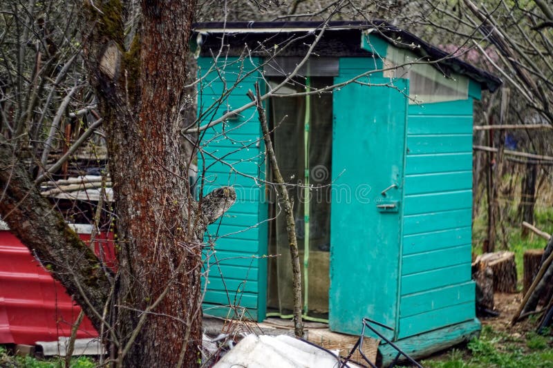 Small Rural Building in the Garden Stock Image - Image of blue ...