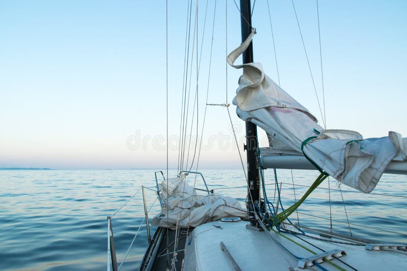 Small Sailboat in the Sunset Stock Image - Image of blue, sunset: 46936017