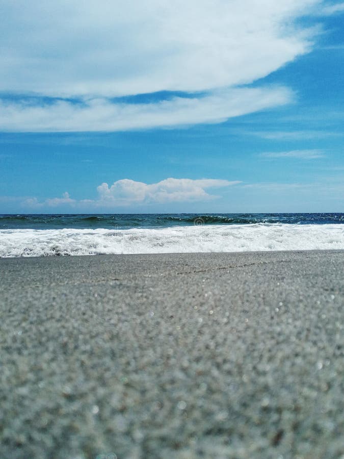 Small sand dunes on beach. stock image. Image of sunlight - 71951149