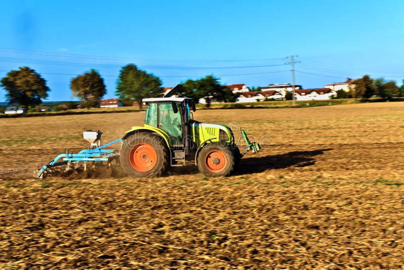 Red Farm Tractor Near Field Stock Photo - Image of farm, growing: 2334618
