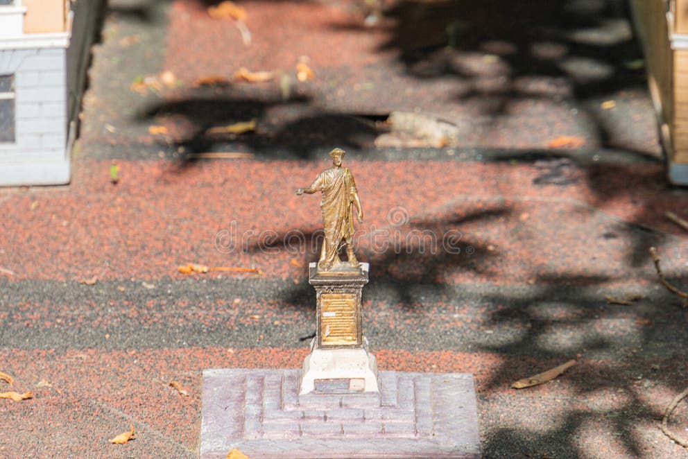 Small-scale Model of an Outdoor Scene with a Human Statue on a Raised ...