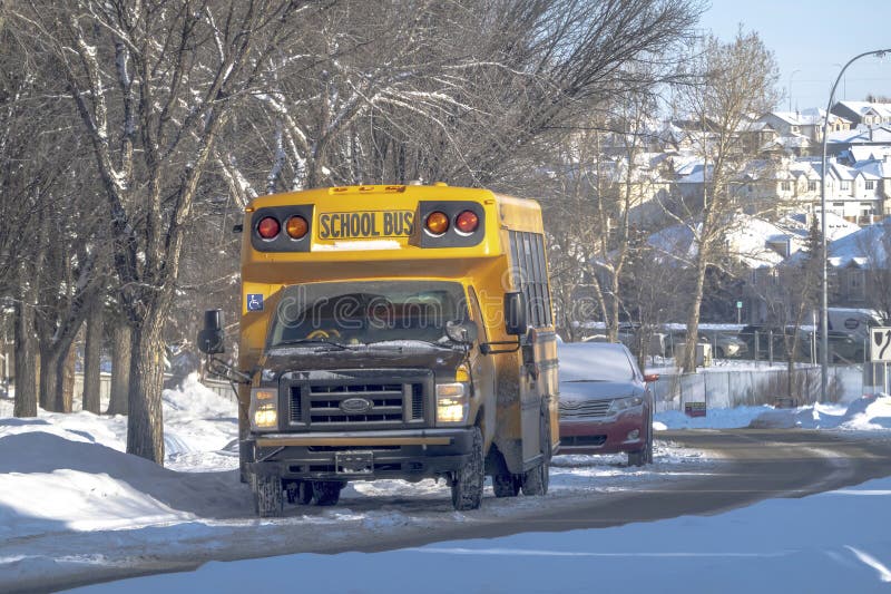 A Small School Bus during the Winter Editorial Photography - Image of ...