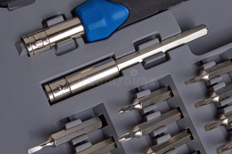 Small screwdriver in a box stock image. Image of screwdriver - 194255147