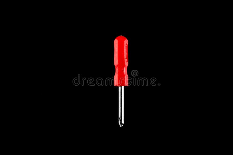 Small Screwdriver with Red Handle on Black Isolated Background Stock ...