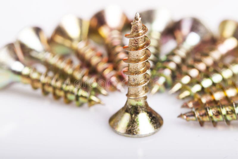 Gold screws stock image. Image of gold, fastening, thread - 6563707