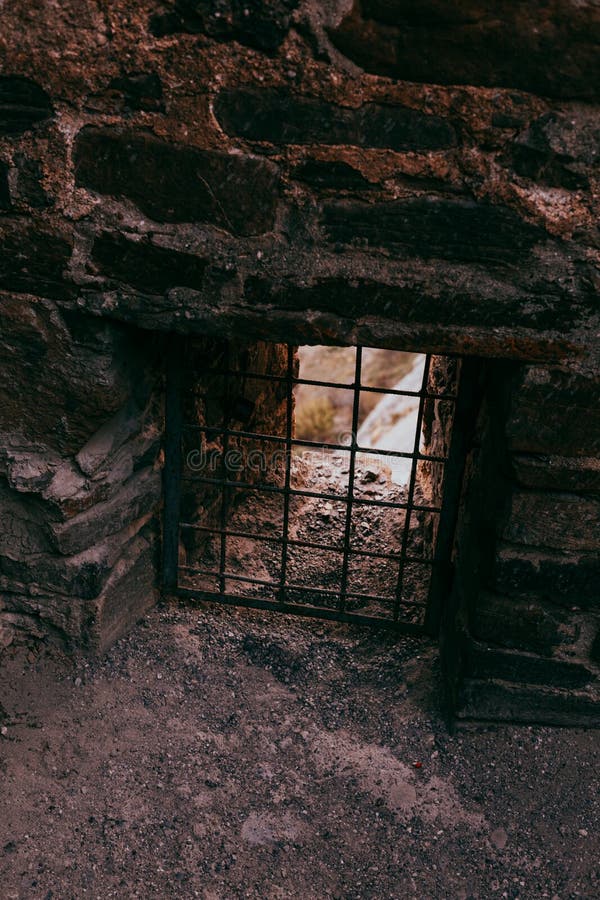 Small Secret Window with Bars in an Ancient Castle Stock Photo - Image ...