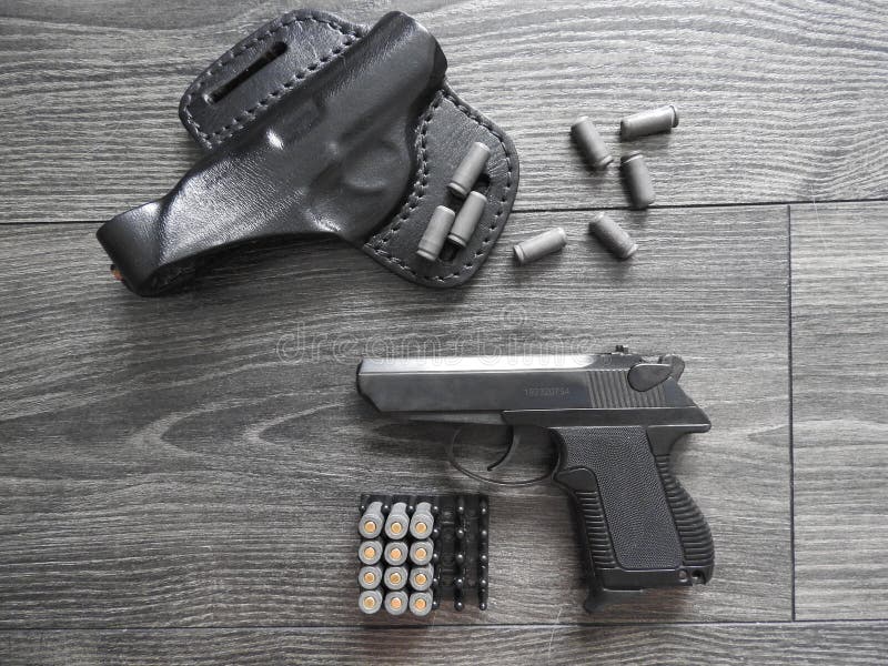 Small Self-loading Pistol PSM 18 Mm, with Cartridges on a Dark ...