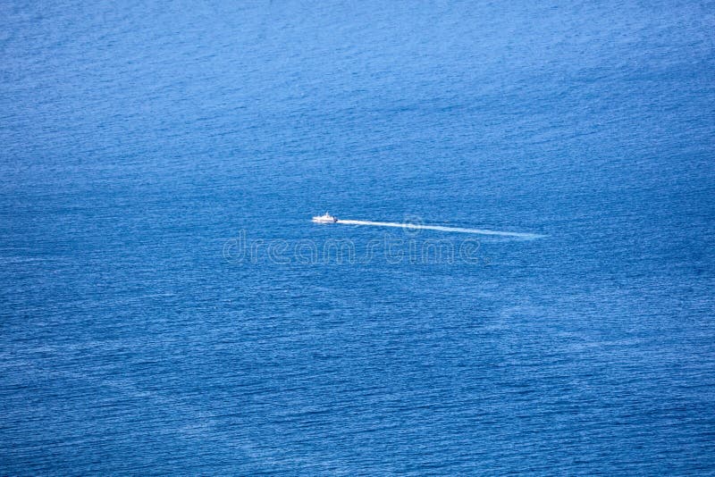 A Small Ship is Sailing in the Blue Ocean Stock Photo - Image of ship ...