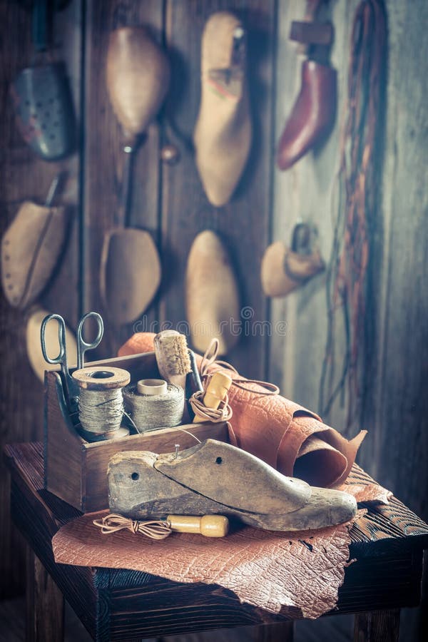 Small Shoemaker Workshop with Shoes, Laces and Tools Stock Image ...
