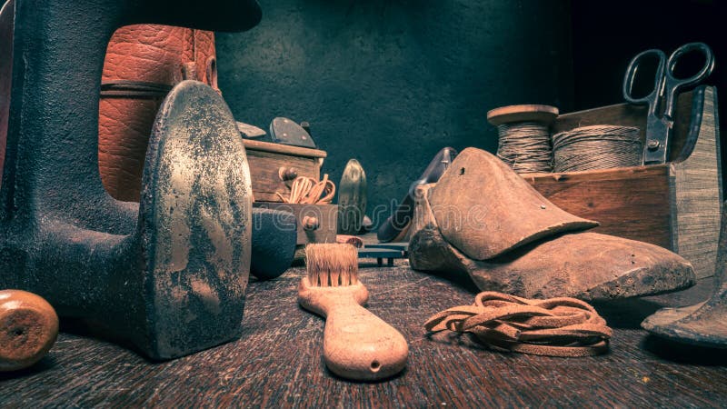 Small Shoemaker Workshop with Tools, Strap, Leather and Rules Stock ...