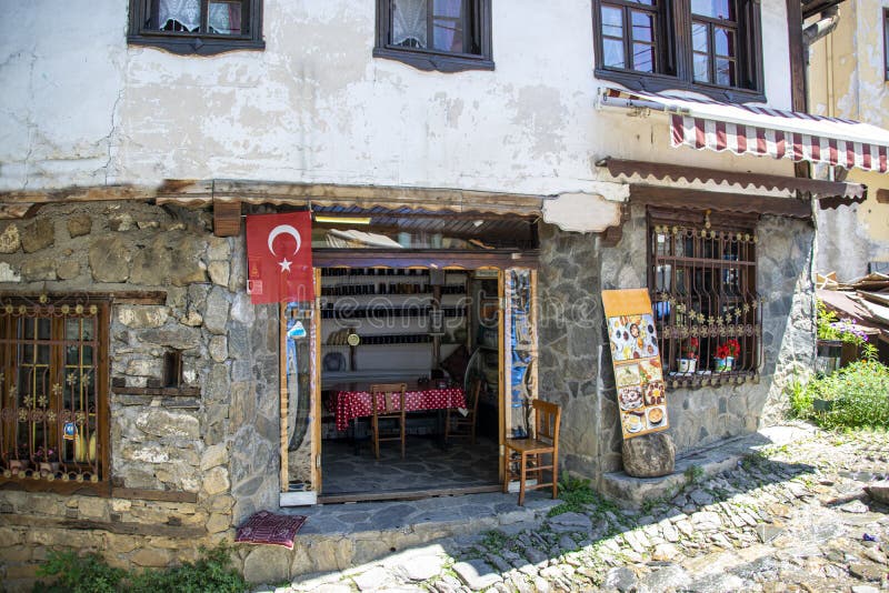 A Small Shop in the Village Editorial Stock Image - Image of shop, flag ...