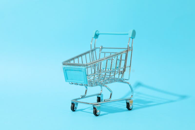 Small Shopping Cart on Blue Background Stock Image - Image of trade ...