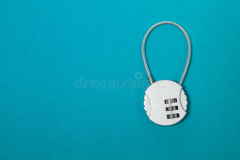 Small Silver Iron Cipher Lock with a Coded Set on Blue Background Stock ...