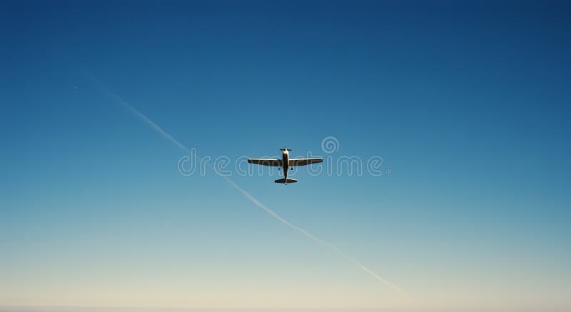 Single-Engine Airplane Soaring through a Cloudless Azure Sky Stock ...