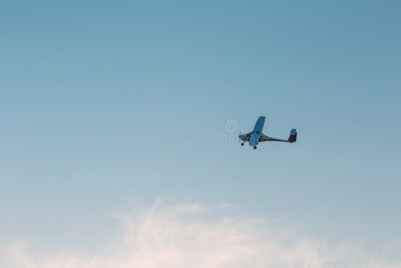 Small Single Engine Airplane Flying Against Sunset Sky Stock Photo ...