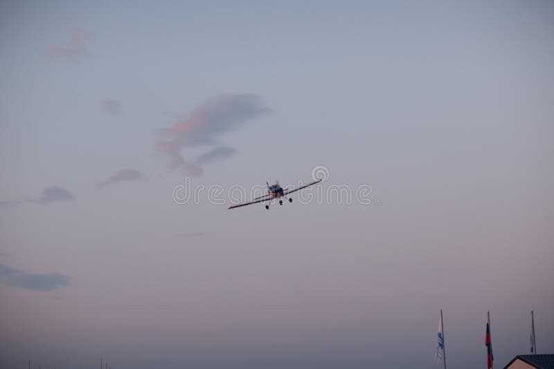 Small Single Engine Airplane Flying Against Sunset Sky Stock Image ...
