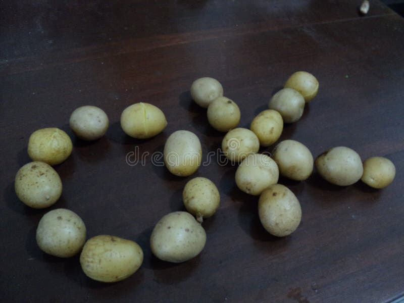 Small Size Potatoes with a Brown Background Stock Photo - Image of beef ...