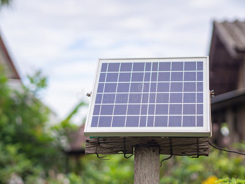 Small Size Solar Cell Panels in the Garden. Stock Image - Image of ...