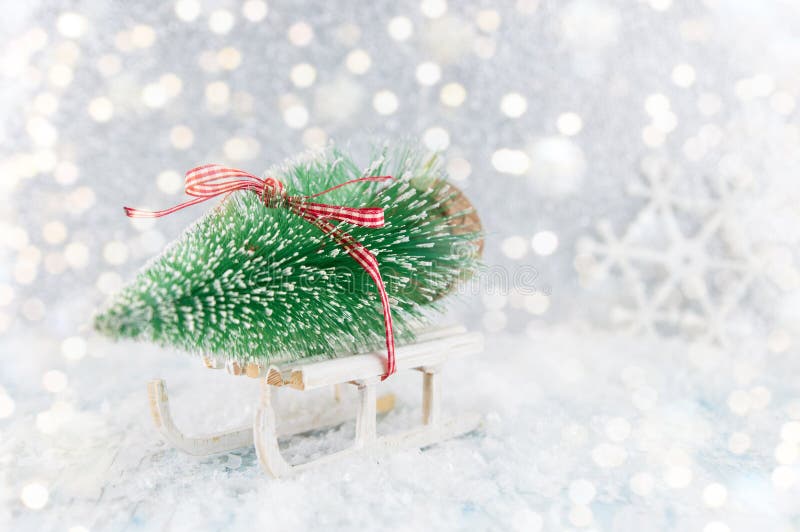 Small Sleigh Carrying a Christmas Tree Miniature Stock Photo - Image of ...