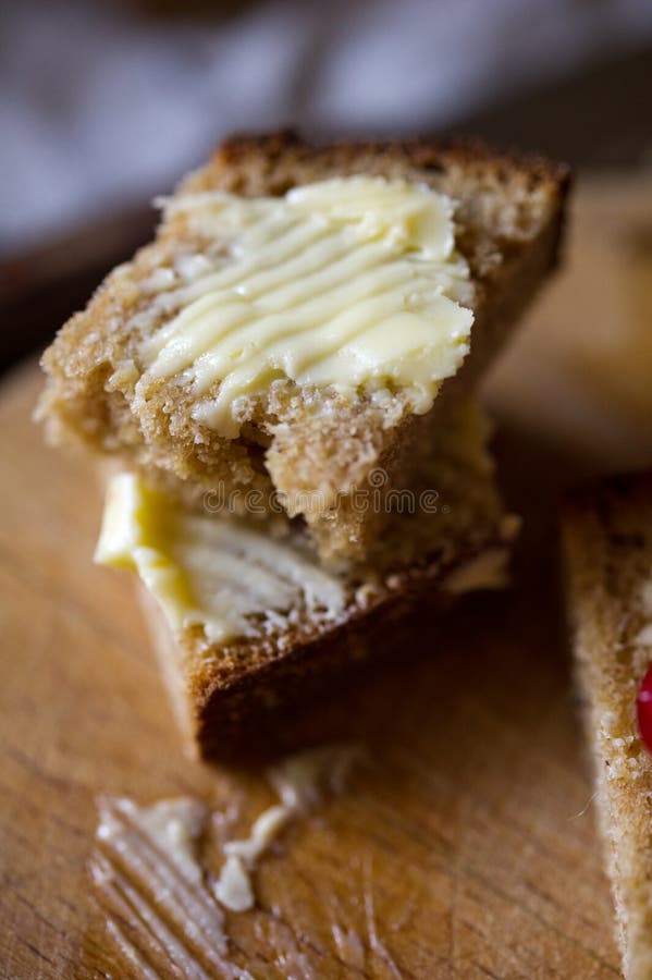 Small Sliced Piece of Wheat Bread and Butter Stock Photo - Image of ...