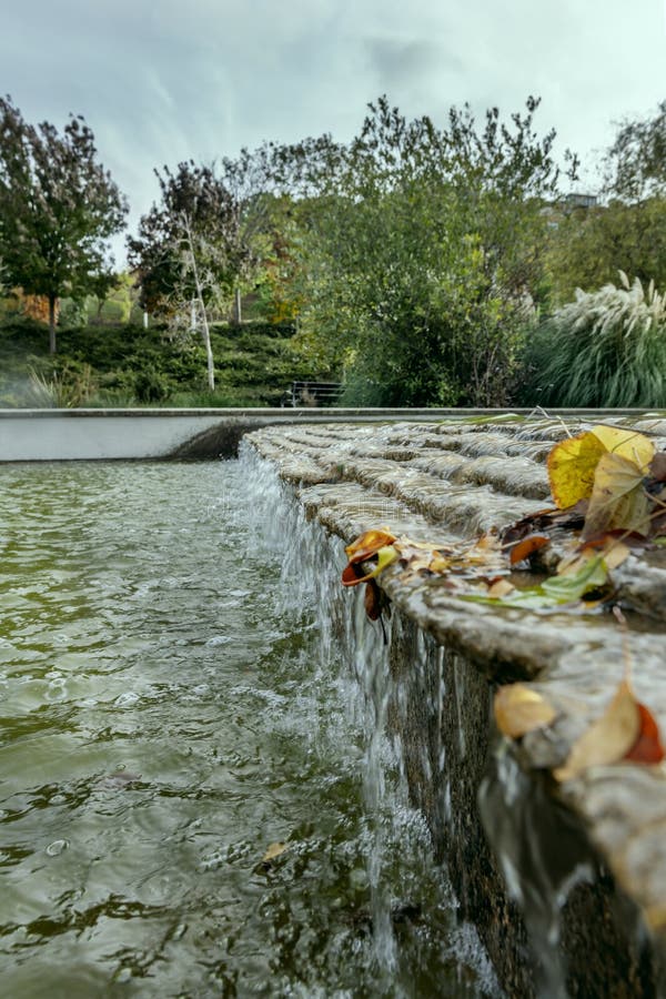 Small Slope with Water Fall in a Canal in an Urban Park Stock Photo ...