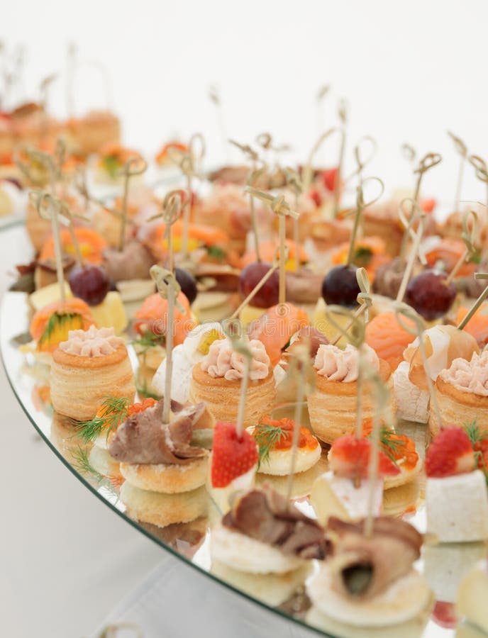 Small Snacks in Plate on Table Stock Photo - Image of snacks ...