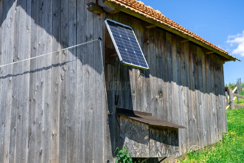 A Small Solar Panel Installed on a Rural Barn of a Farm, Producing ...