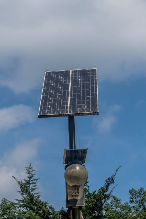 Small Solar Panel on Top of Light Pole Stock Photo - Image of ...