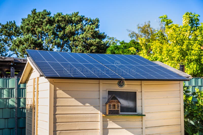 Small Solar Panels Installed on Garden Shed, Backyard Shed Stock Photo ...