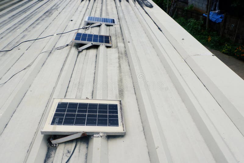 Small Solar Panels Installed on a Metal Sheet Roof Stock Photo - Image ...