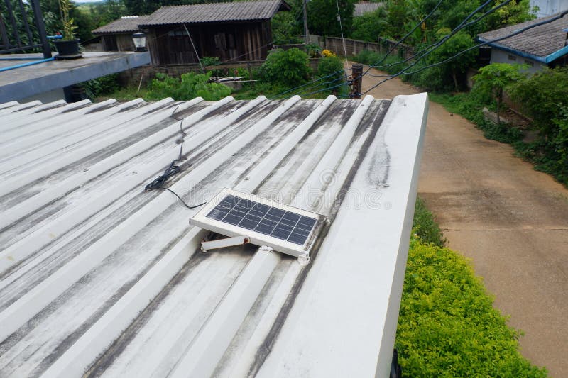 Small Solar Panels Installed on a Metal Sheet Roof Stock Image - Image ...