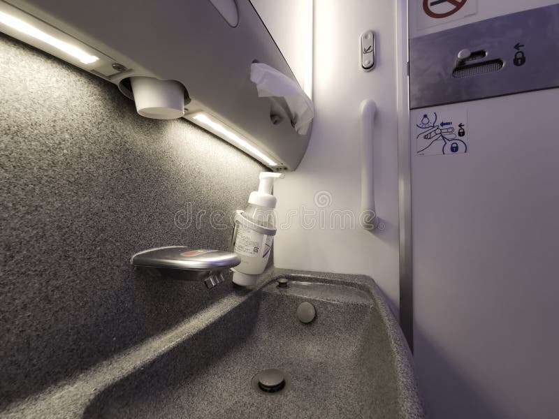 Inside Airplane lavatory . stock photo. Image of basin - 168021782