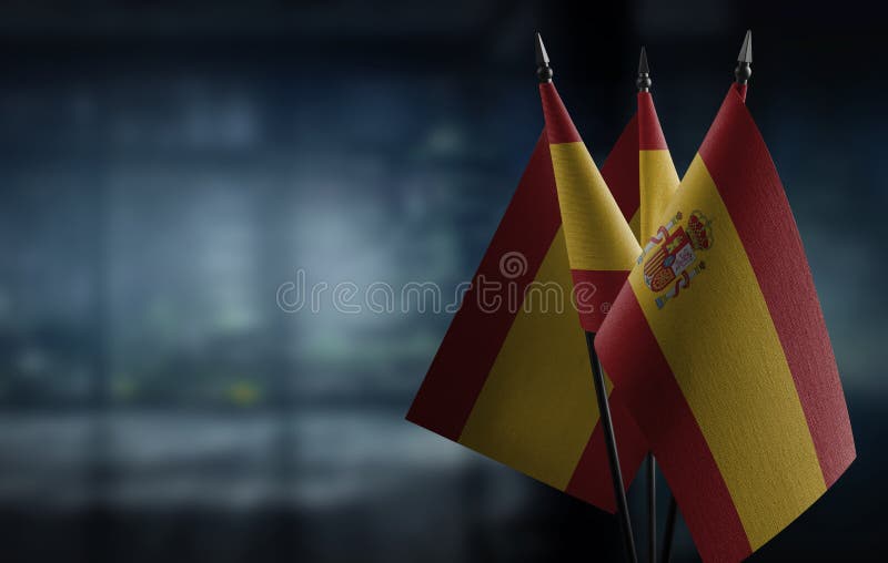 A Small Spain Flag on an Abstract Blurry Background Stock Image - Image ...