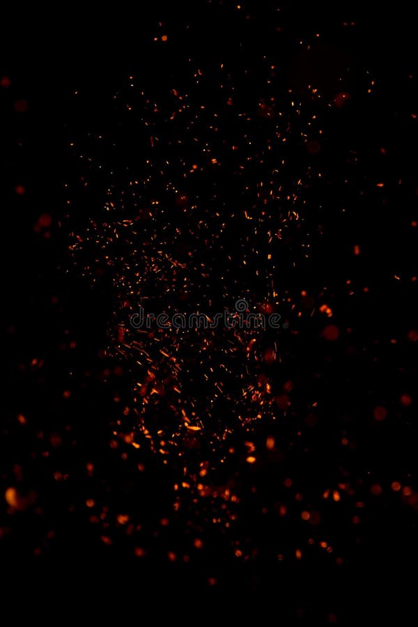 Small Sparks of Fire on a Black Background Stock Photo - Image of small ...