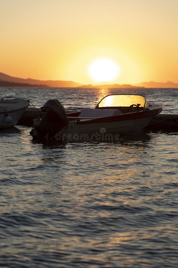Small Speed Boat in a Small Marina at Sunset Stock Image - Image of ...