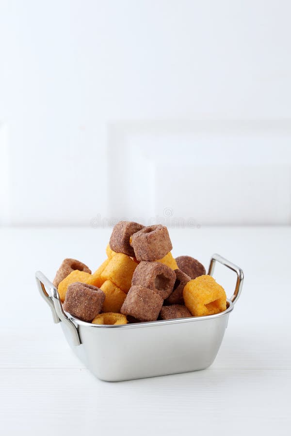Small Square Cheese and Chocolate Wafer on Stainless Bowl Stock Photo ...