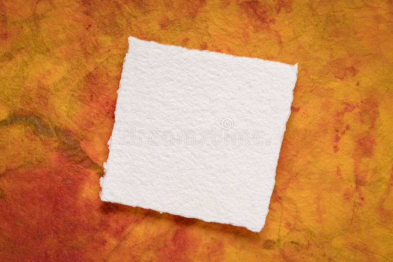 Small Square Sheet of Blank White Paper Against Colorful Marbled Paper ...