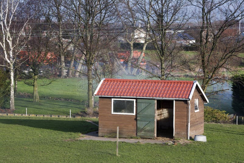 Small stable stock image. Image of farm, door, green - 38060791