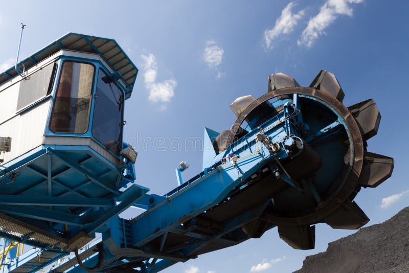 Small Stacker- reclaimer stock image. Image of stockpile - 25851859